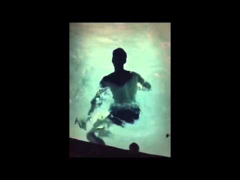 Justin Bieber swimming in a pool at Matthew Espinosa's birthday party ...