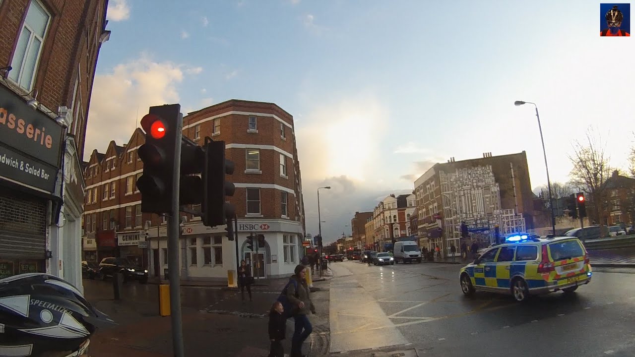 Red Light Jumping Cyclist caught by the Police - YouTube