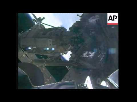 Astronauts install shields on space station - YouTube