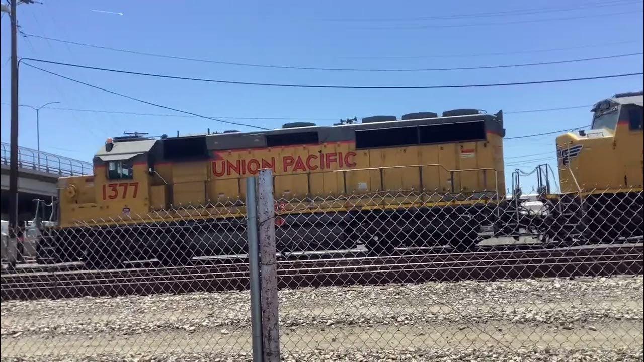 UP 1377 pulls forward and stops for switch and backs up - YouTube