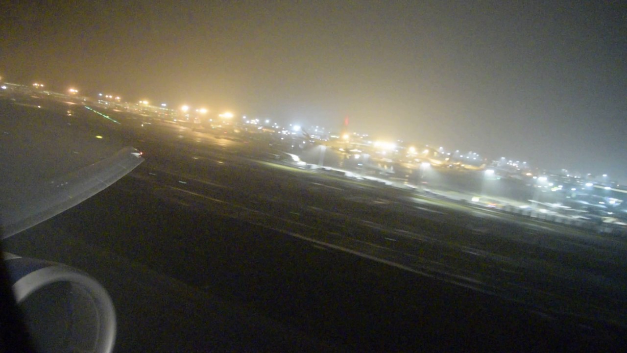 Night takeoff from New York (JFK) on a Delta 767-400ER business class ...