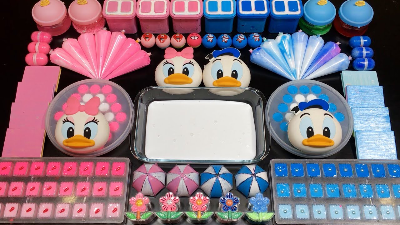 Satisfying PINK vs BLUE Slime ASMR! 💖 Donald & Daisy Duck Slime ...