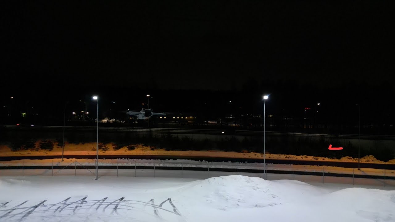 Drone DJI Mini 3 Pro. Night reflection of the drone in the mirror ...