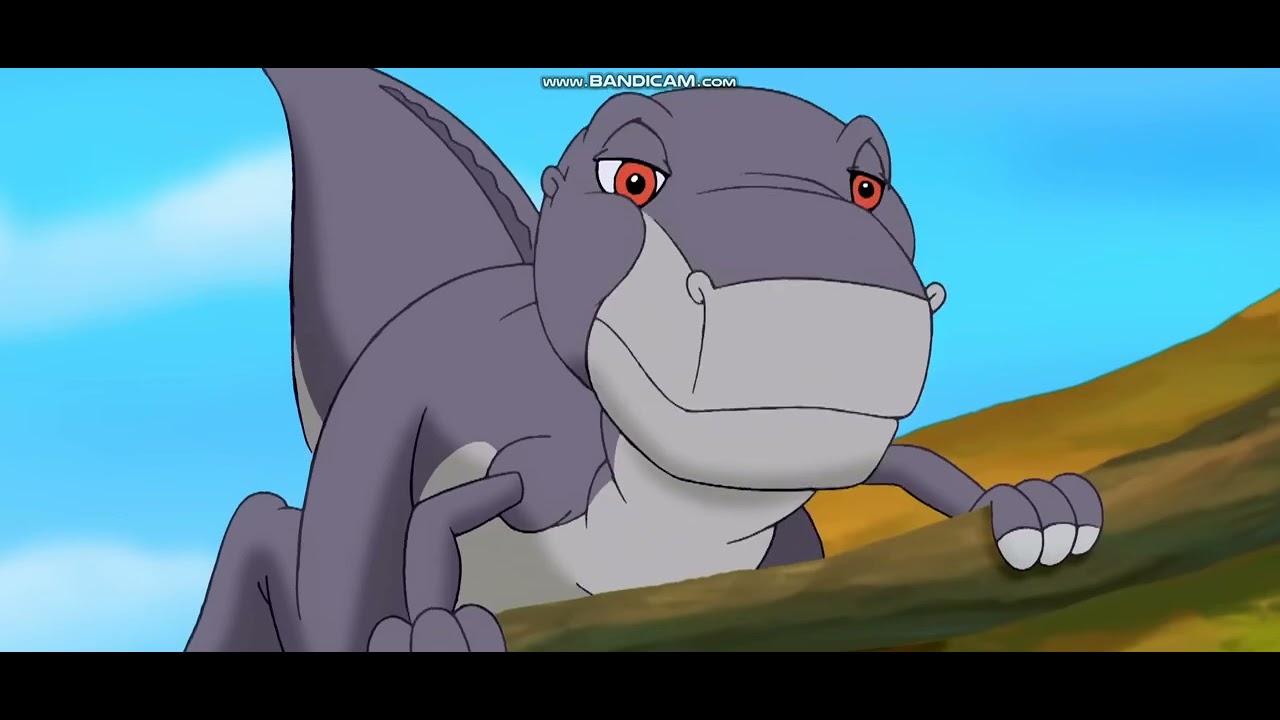 The Land Before Time (2007) - Littlefoot saves Chomper from falling to ...
