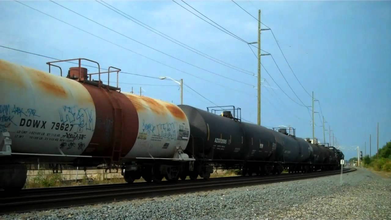 CSX 7681 leads a mixed freight through Indianapolis - YouTube