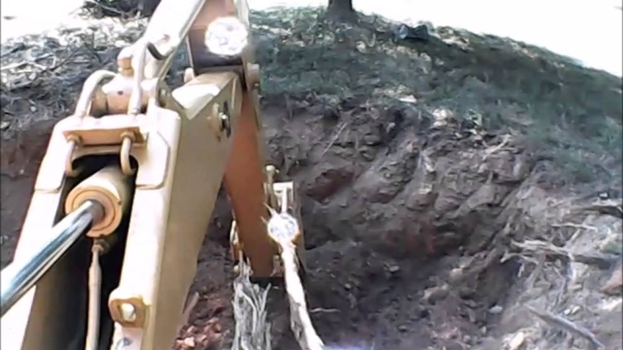 Digging hole for tree using 1987 JOHN DEERE 210C backhoe loader - YouTube