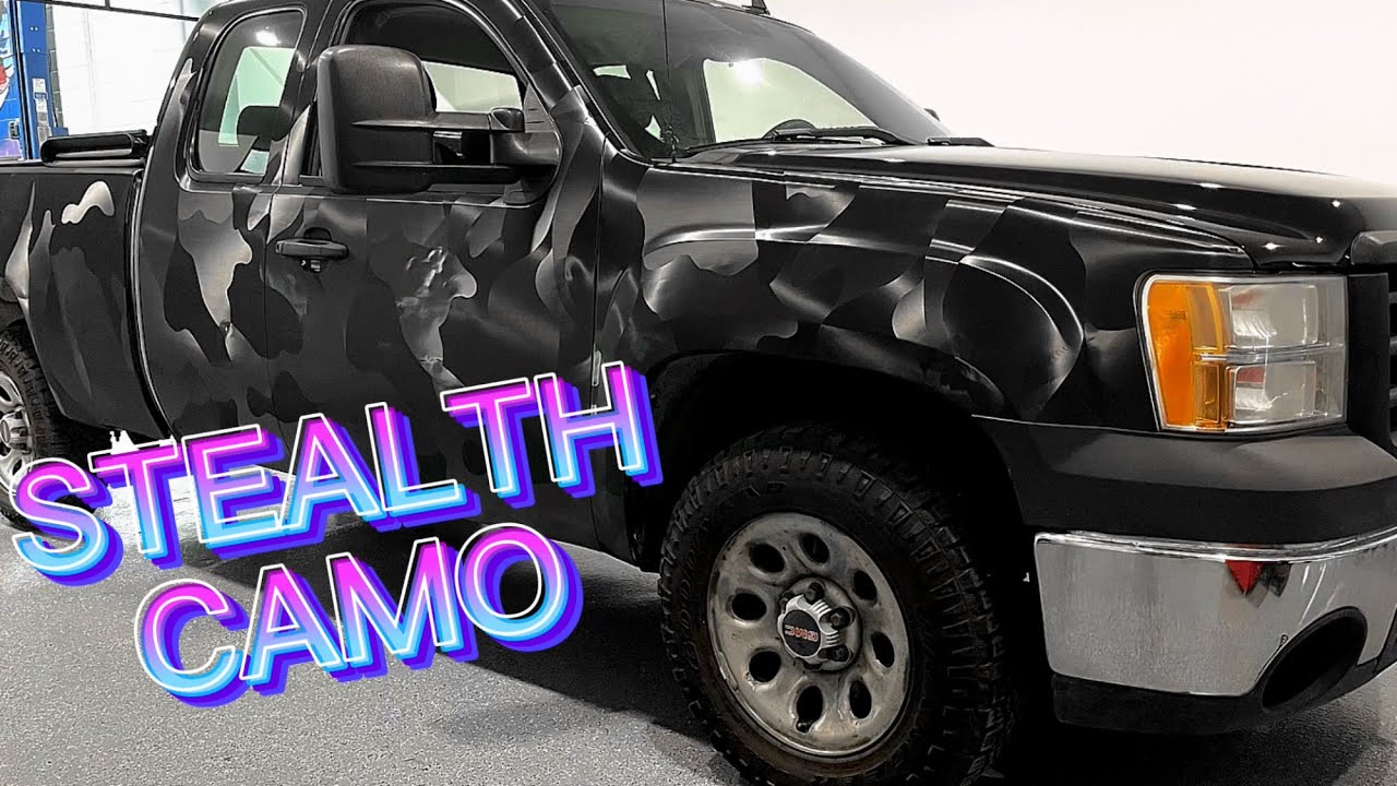 Wrapping a GMC Sierra in Vvivid Black Stealth Camo - YouTube
