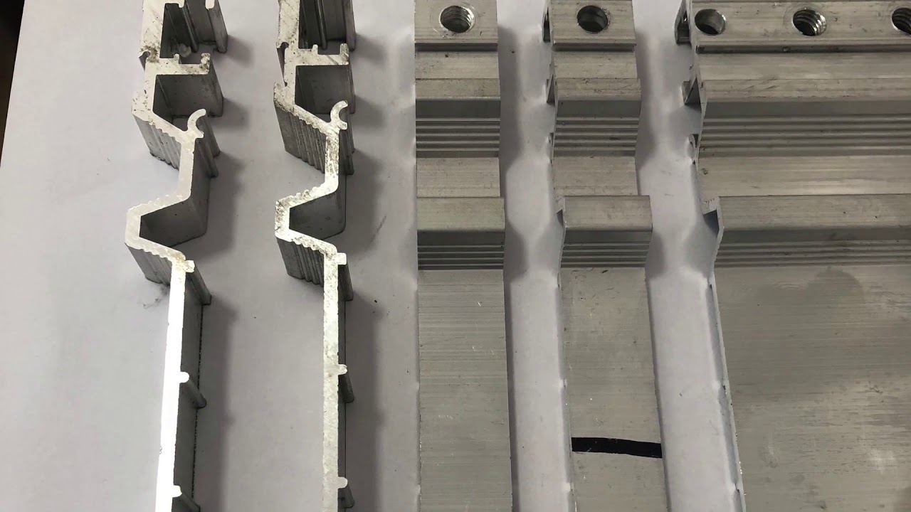 Automatic Aluminium Profiles Punching Tapping Cutting Machine - YouTube