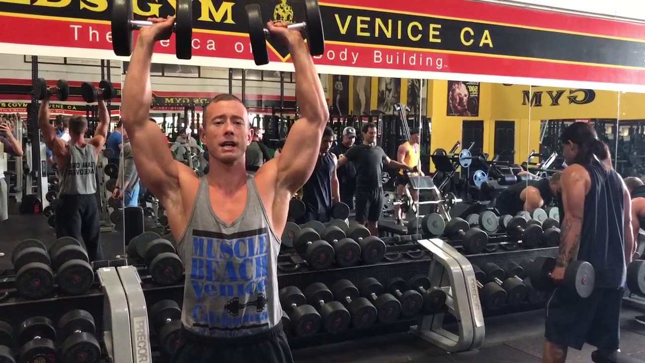 Shoulder presses at Golds Gym Venice - YouTube