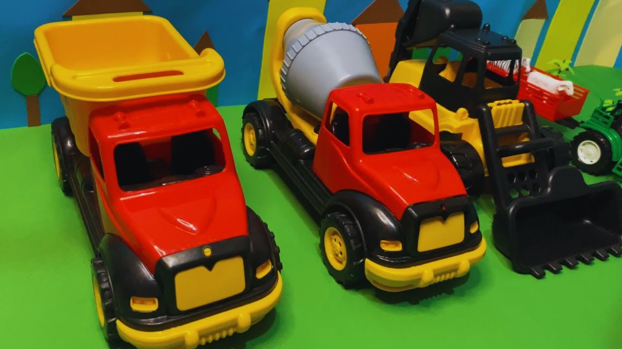 presenting my toy buckets, trucks, concrete mixers and toy tractors ...