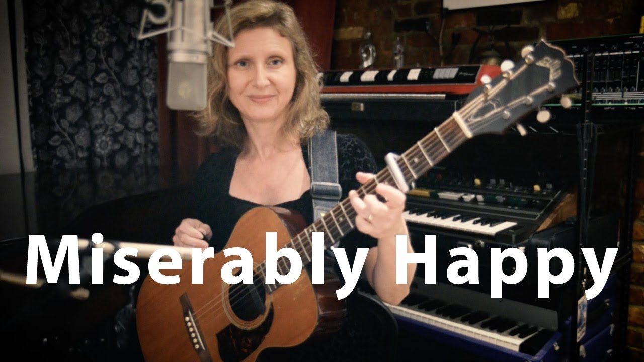 Miserably Happy - YouTube