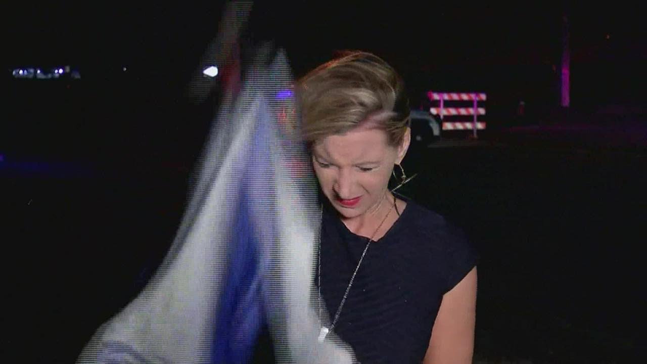 Houston reporter has to take cover during live coverage on-air - YouTube