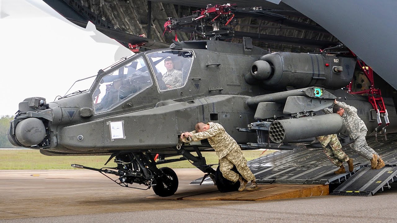 Unloading Big US Attack Helicopter From Gigantic Cargo Aircraft - YouTube