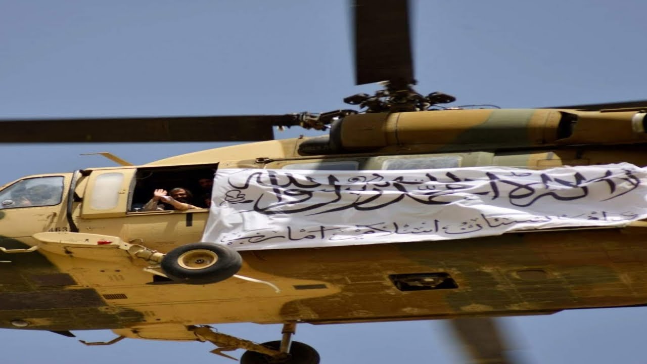 Taliban fighters flying American helicopters and enjoying the ride ...