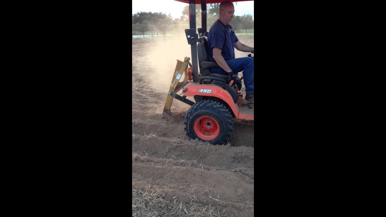 Kubota BX2370 using Subsoiler - YouTube