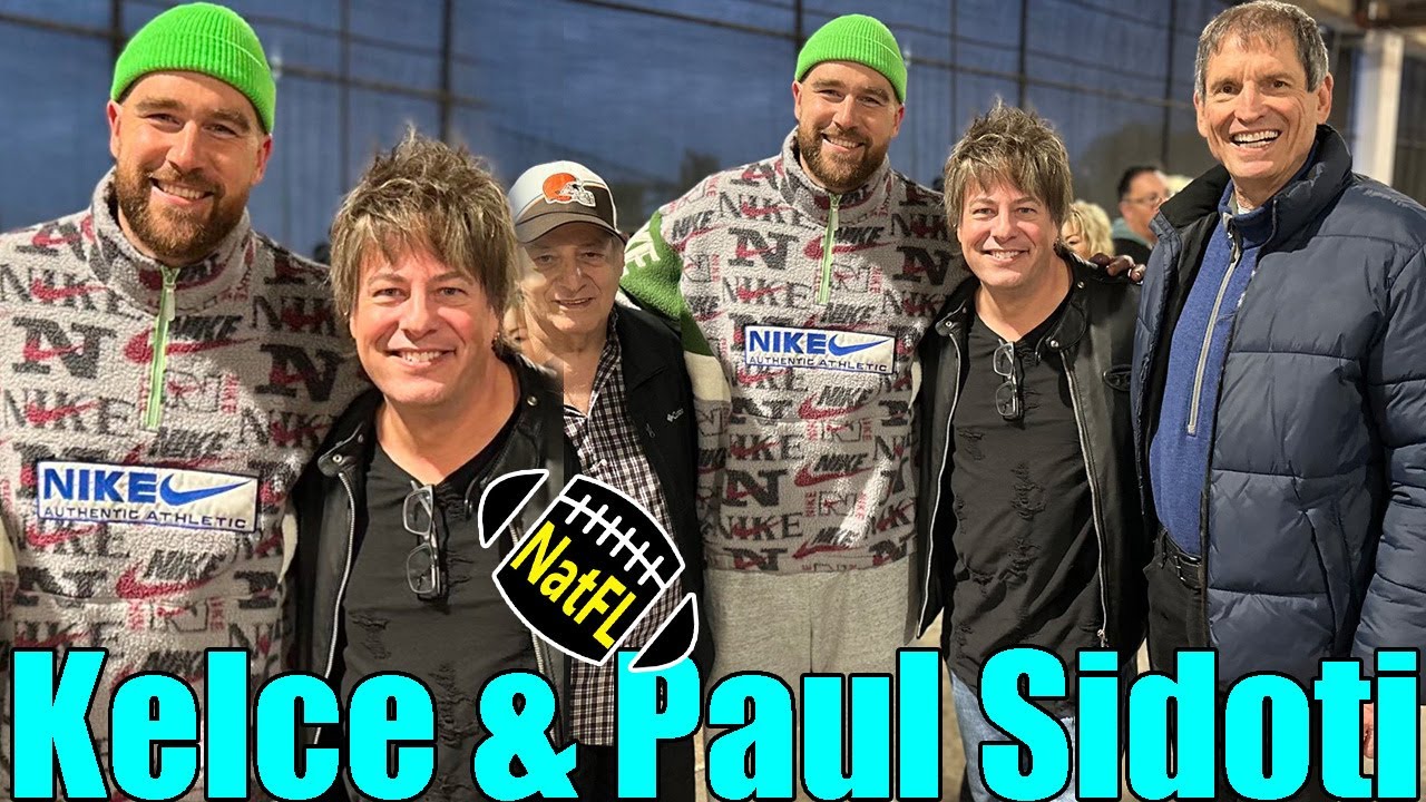 Travis Kelce poses with Taylor Swift's longtime lead Guitarist Paul Sidoti after the Chiefs' win ...