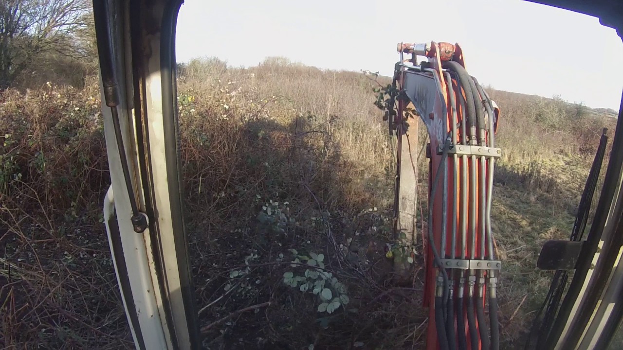 Clearing brambles kubota kx91-3 - YouTube