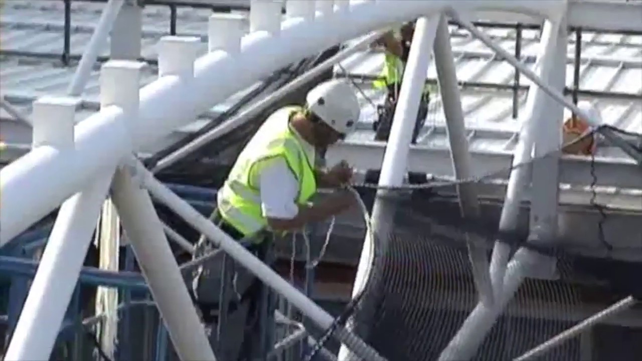 Guide to installing work positioning netting to ETFE structures - YouTube