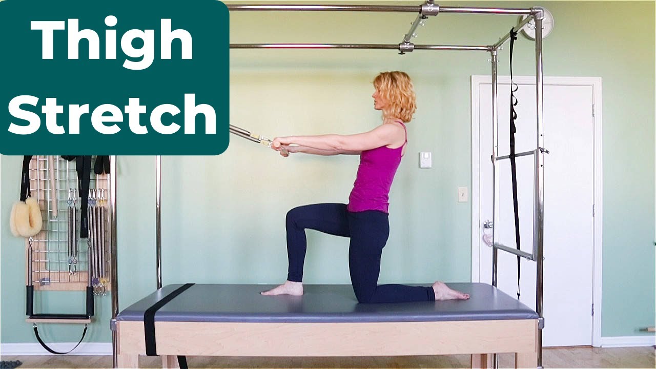 Thigh Stretch on the Trapeze Table/Cadillac⎮Pilates Encyclopedia - YouTube