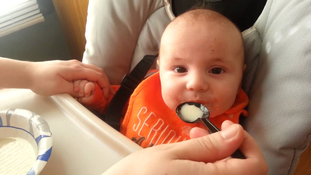 Baby's first meal! very cute! - YouTube