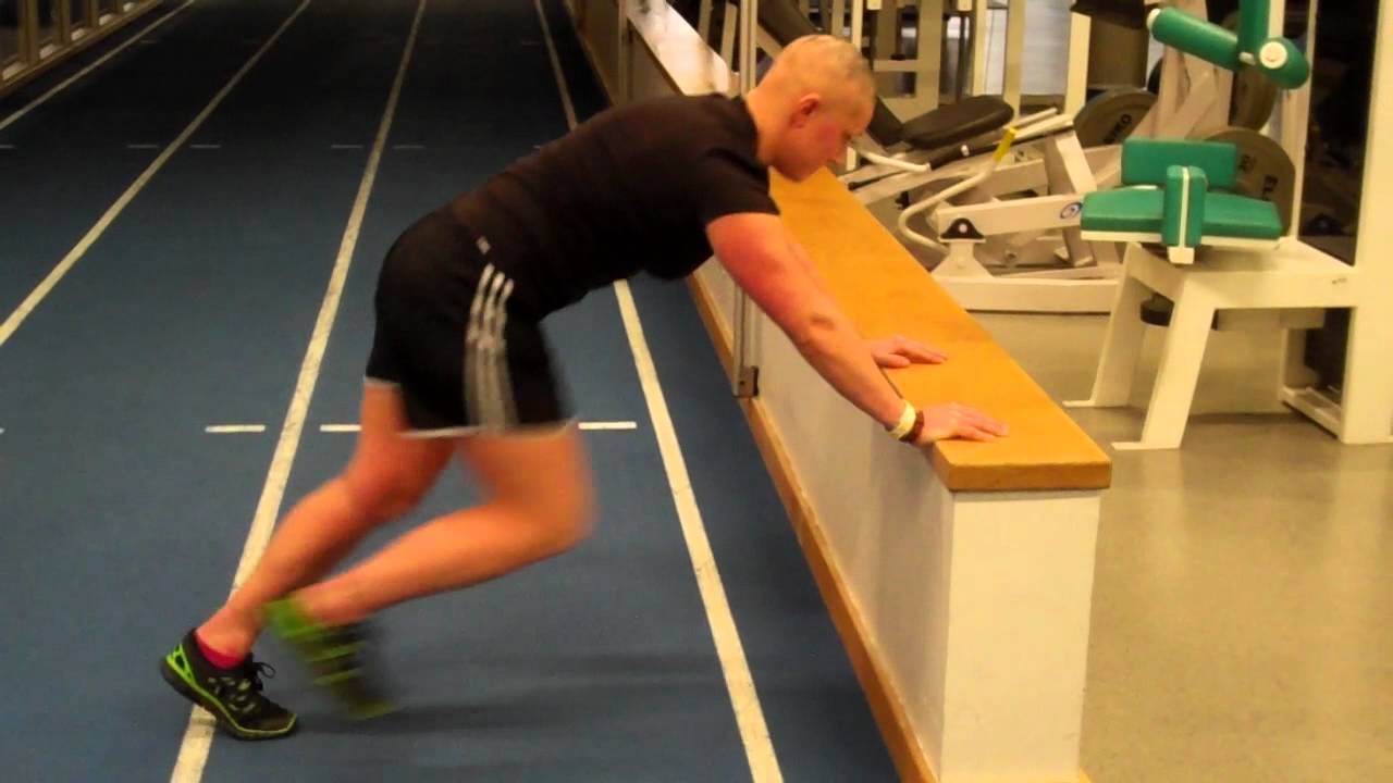Wall Step Back and knee Drive - YouTube