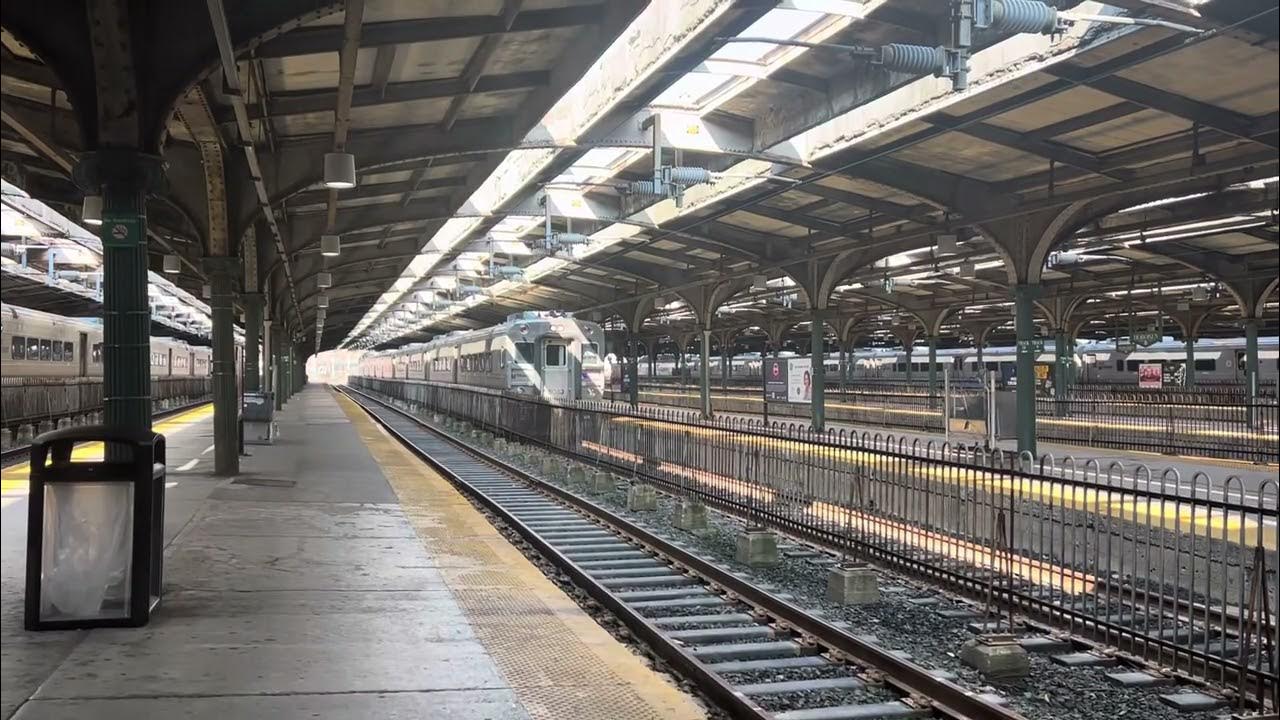 NJT 6083 leads A NJT train into the terminal at Hoboken - YouTube