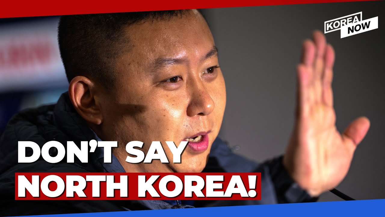 Footage of N. Korean football coach hitting back at S. Korean reporter ...