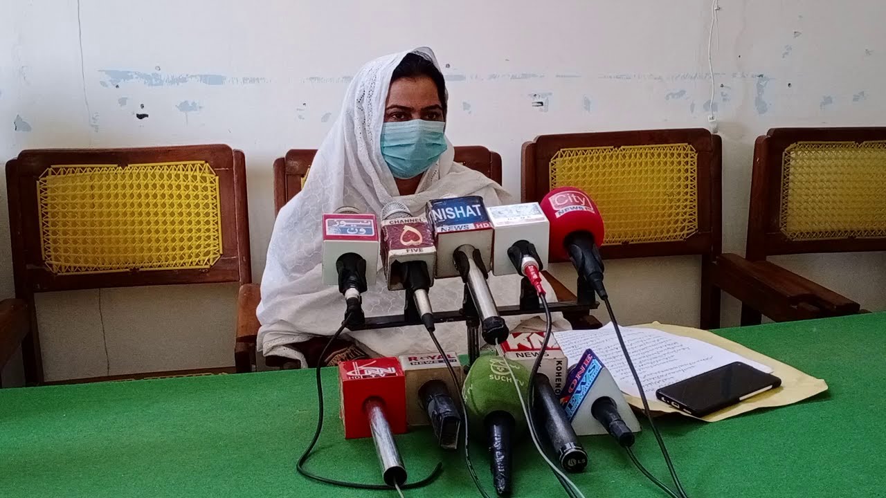 A woman claiming to be the widow of Khalid Ashiq Khalid, owner of ...