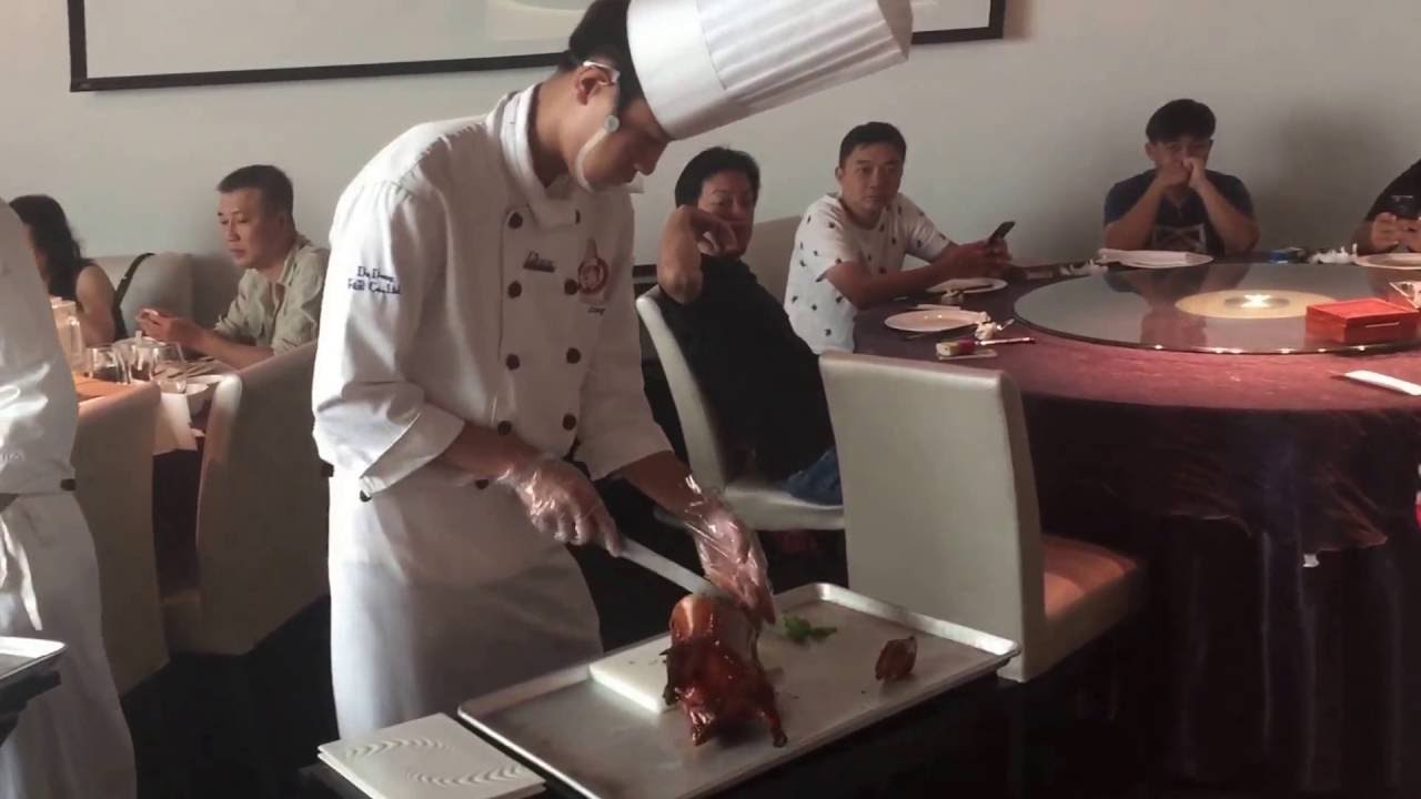 Beijing Must Eats! Da Dong Restaurant - Chef serves famous Peking Roast ...