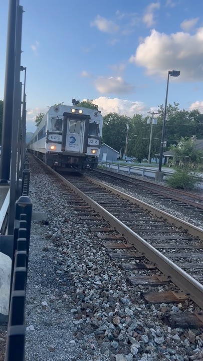 Metro North Harlem Line southeast bound with cab car 6312 and GE P32AC-DM 220 at Dover Plains ...
