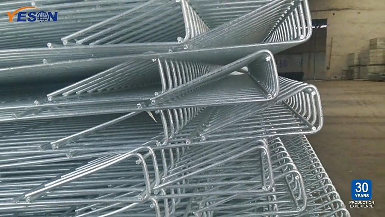 The process of making a BRC fence with a bending machine - YouTube