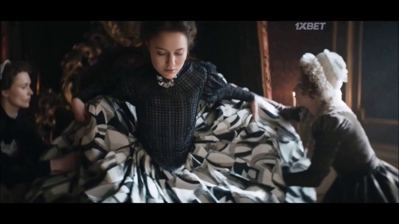 Dominique Devenport lays on a bed in a big black and white skirt - Sisi ...