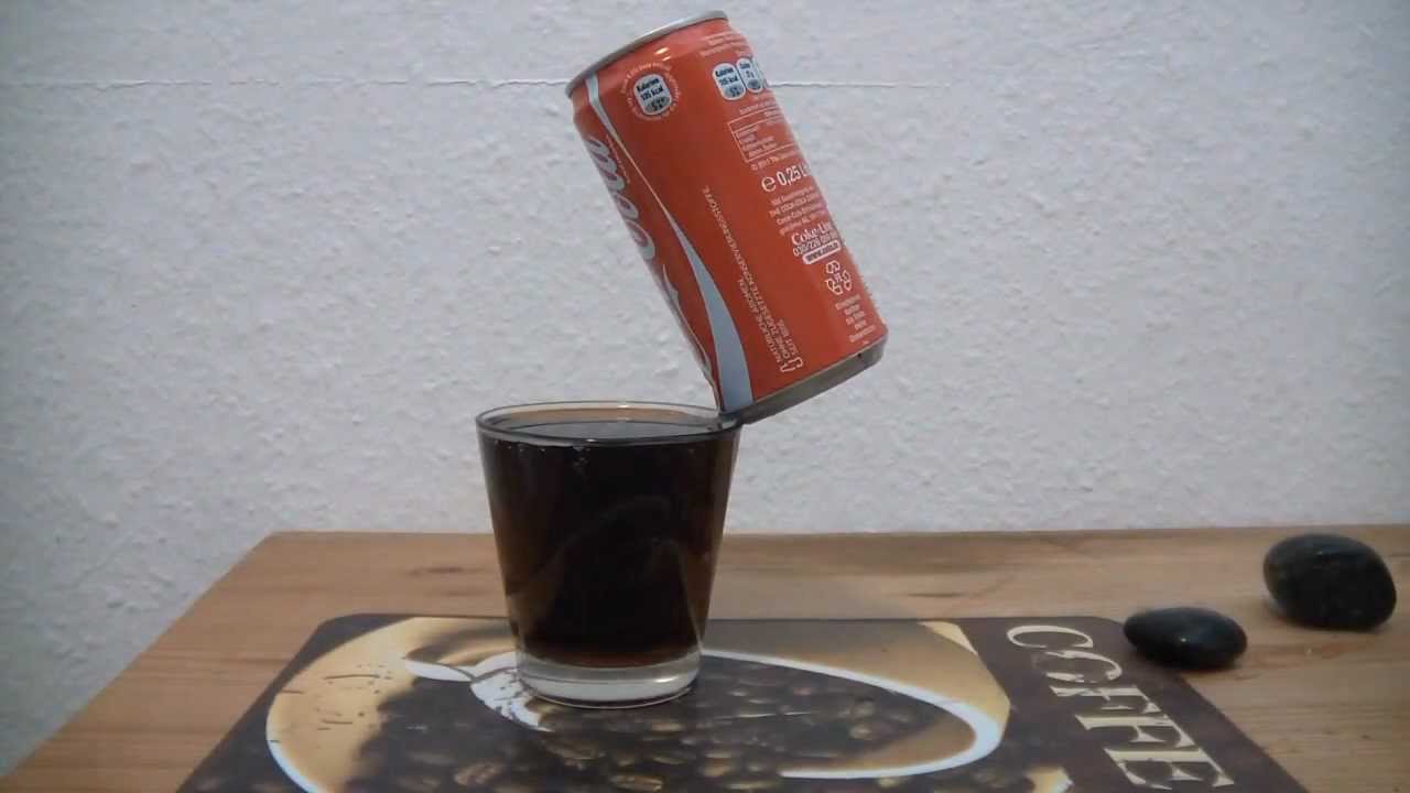 Coke Can balancing on edge of a glass WOW - YouTube