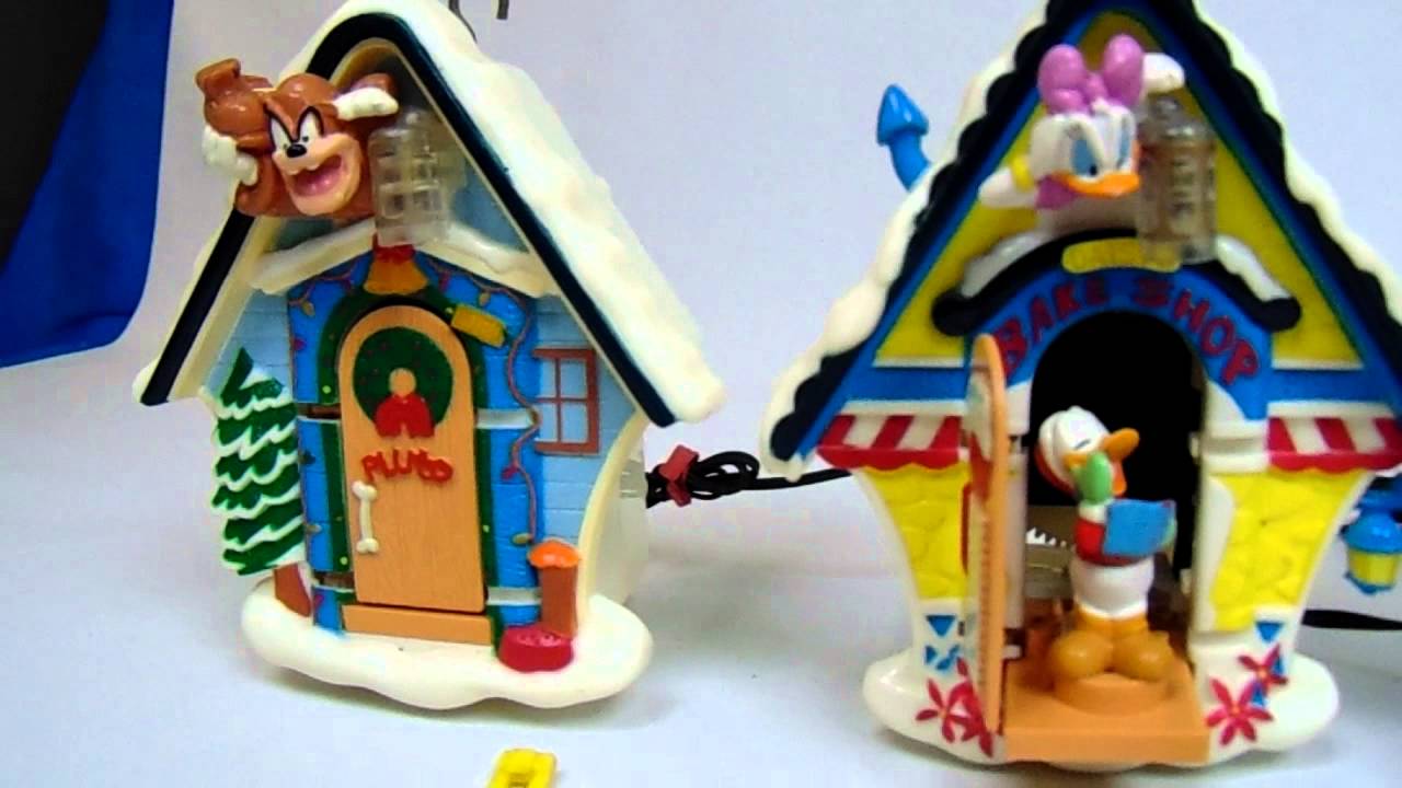 Mr Christmas Mickey's Clock Shop Set of Four Sitting on Table - YouTube