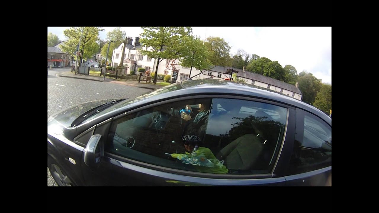Car driver eats breakfast behind the wheel. DA07 HRX 060514 - YouTube