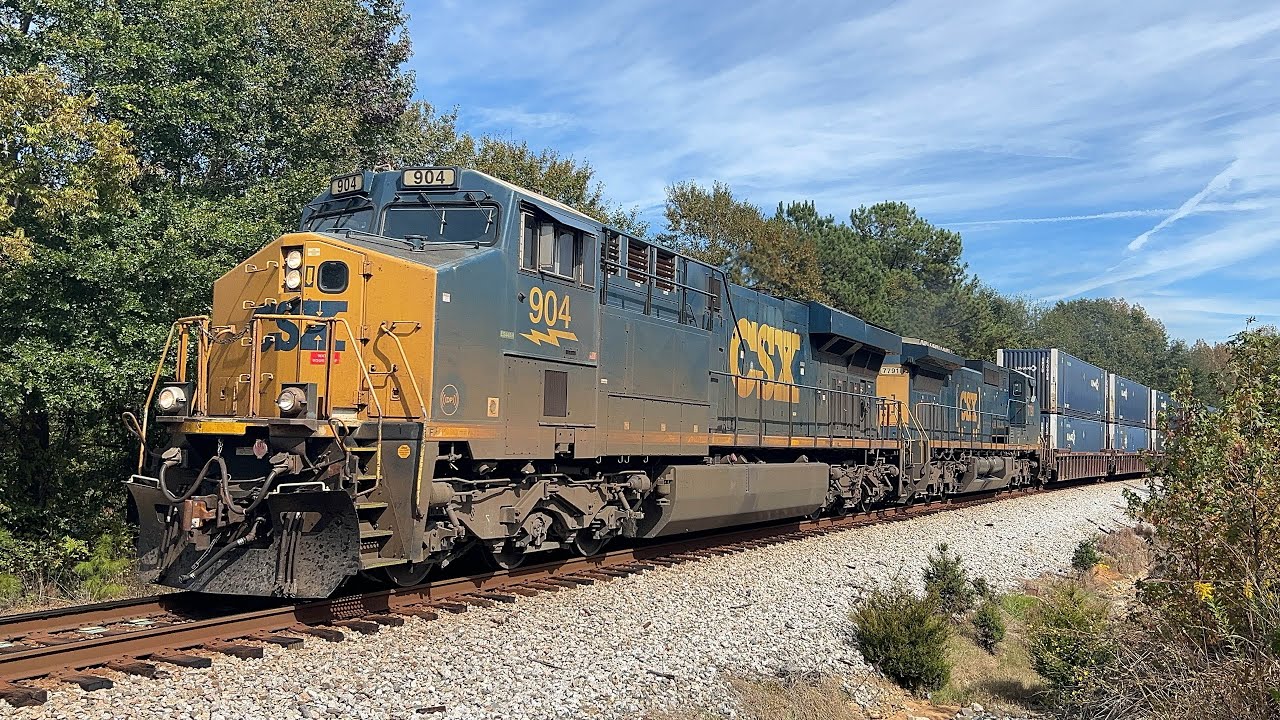 CSX 904, 7791 & 3144 doubled loaded coming around the bend in Warm ...