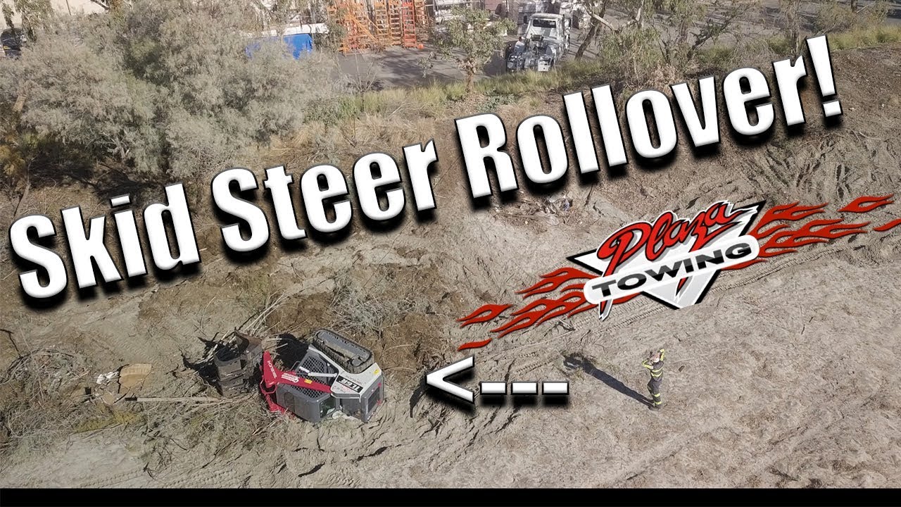 Skid Steer Rolled Over! Tow Truck Recovery With Drone Footage - YouTube