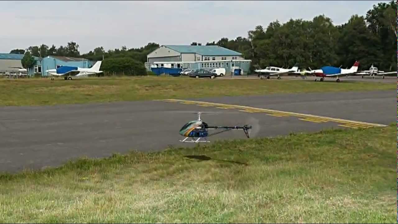 700e Inverted Autorotation with Half PiroFlip in Phoenix RC - YouTube