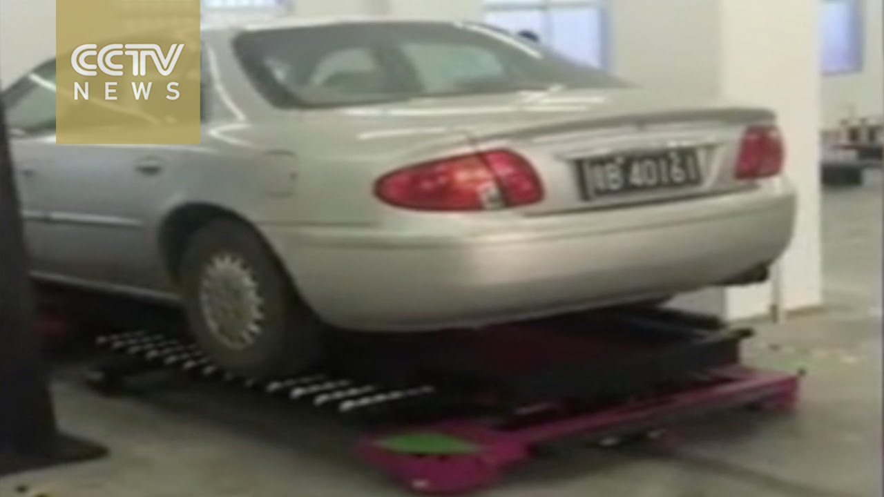 Chinese startup creates automated parking valet robot - YouTube