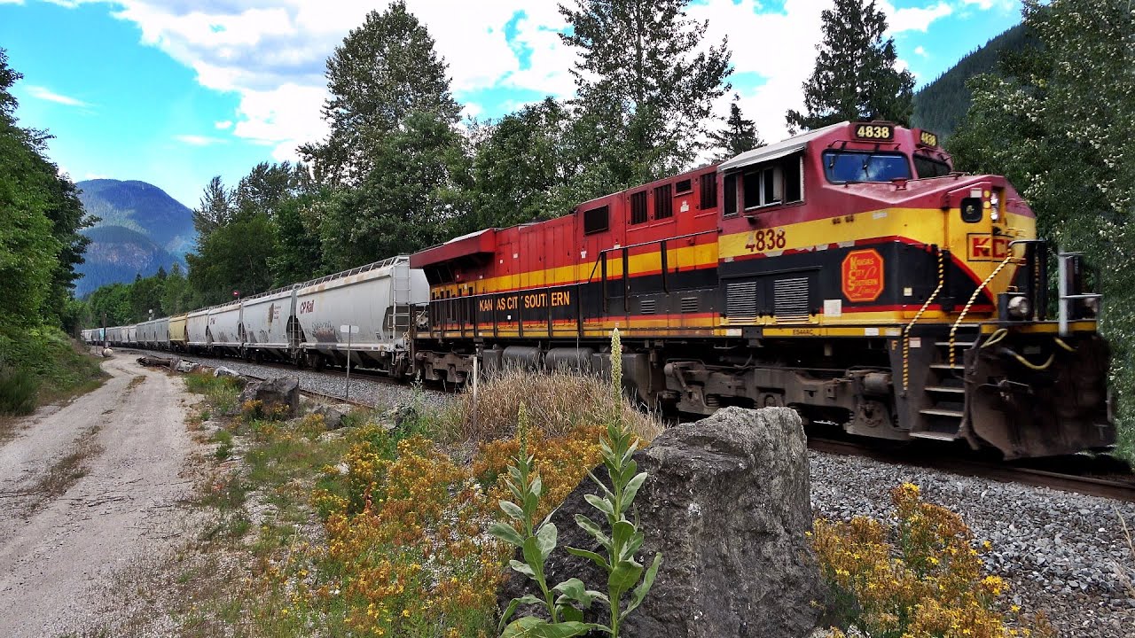Huge CPKC Grain Train w/ KCS DPU Comes To A Screeching Stop For Trains Ahead! - YouTube