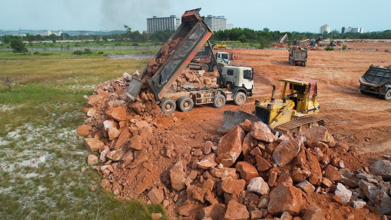 Satisfying Operator At Big Land Reclamation Operating Bulldozer Pushing ...