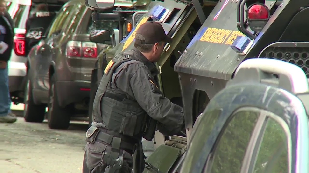SWAT, police outside home where Cleveland officer who broke GPS monitor ...