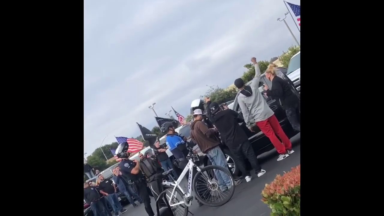 Disrespectful guy interrupting protest speech gets checked! Grover ...