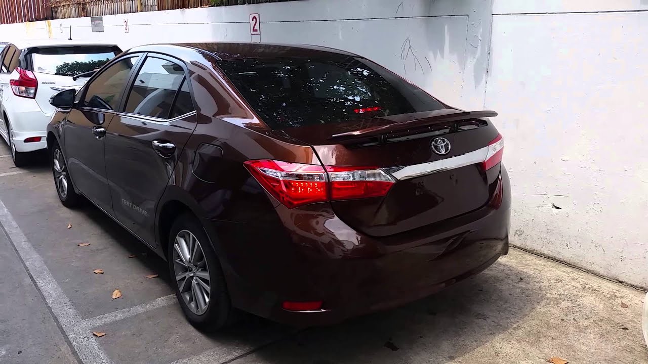 Toyota Altis rear active spoiler - YouTube