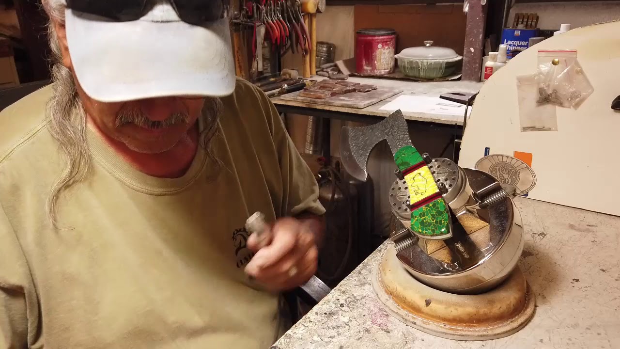 David Yellowhorse working magic on a hatchet - YouTube