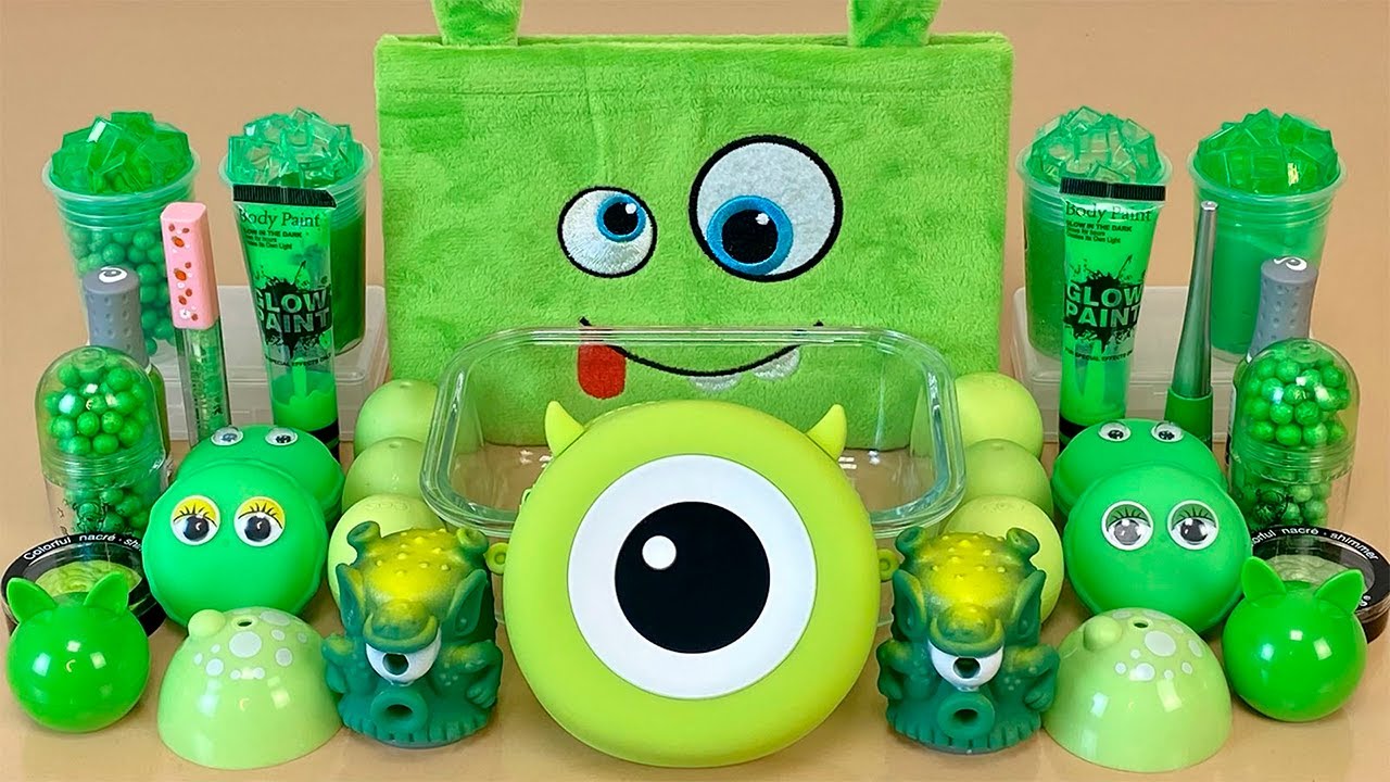 ASMR Slime 💚 Mixing ”GREEN” makeup, Eyeshadow, glitter into slime ...