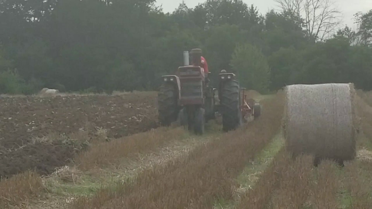 Massey 1100 narrow front, with massey 88 4 bottom plow - YouTube