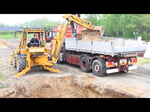 Loading Mercedes Axor 2543 With An Hydrema 806 Backhoe