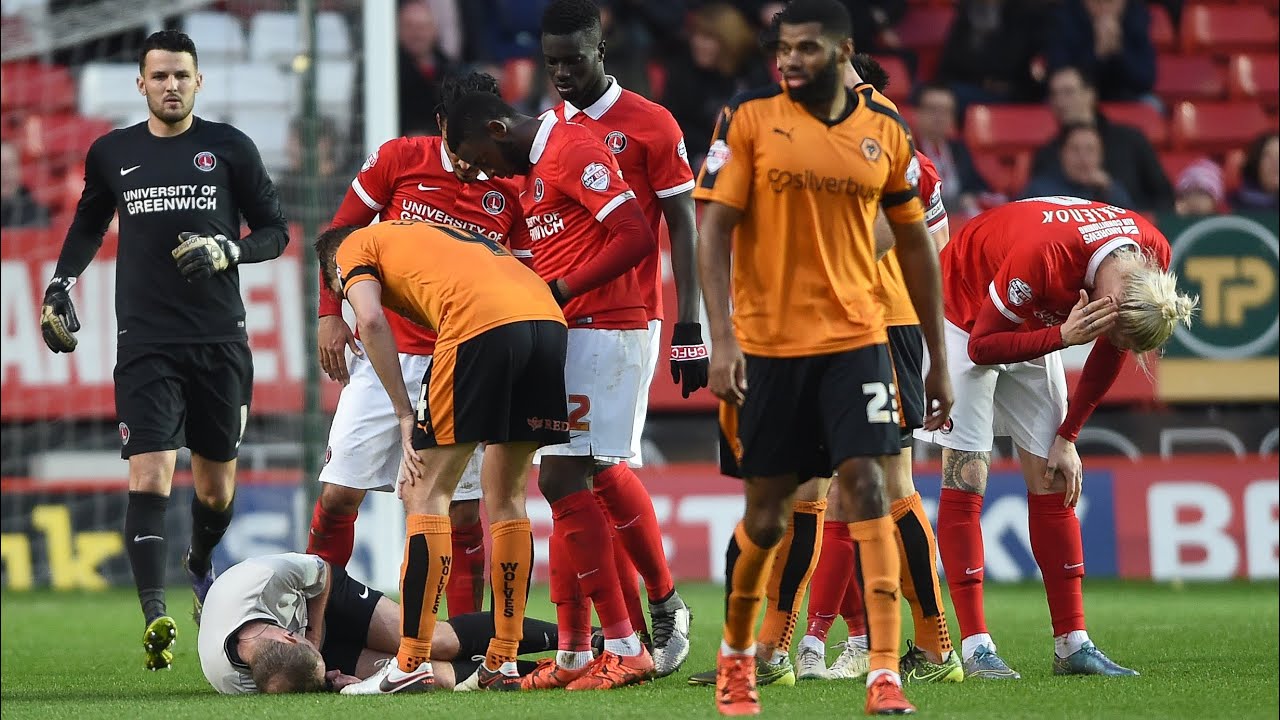 OUCH! Referee Keith Hill gets knocked over by Simon Makienok - YouTube