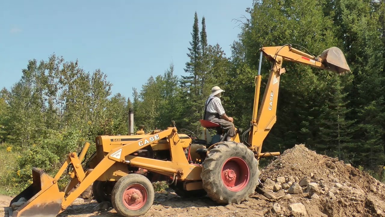 Case G430 loader backhoe - working the machine plus going through the ...